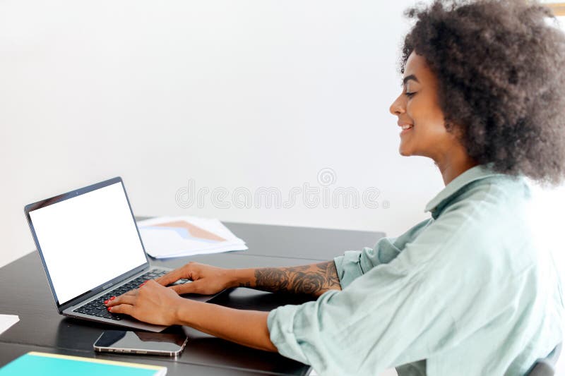 Photo Over the Shoulder of the Woman Sitting in Front of Laptop and ...