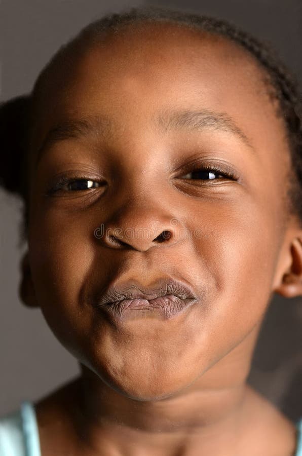 African Girl Pressing Her Face Against a Window Stock Photo - Image of ...
