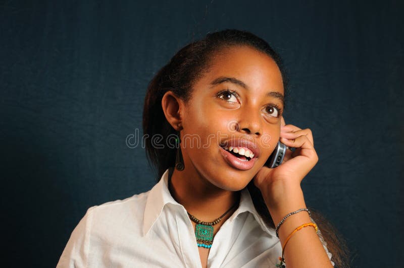 African Girl Using Cell Phone Stock Photo - Image of beautiful, african ...