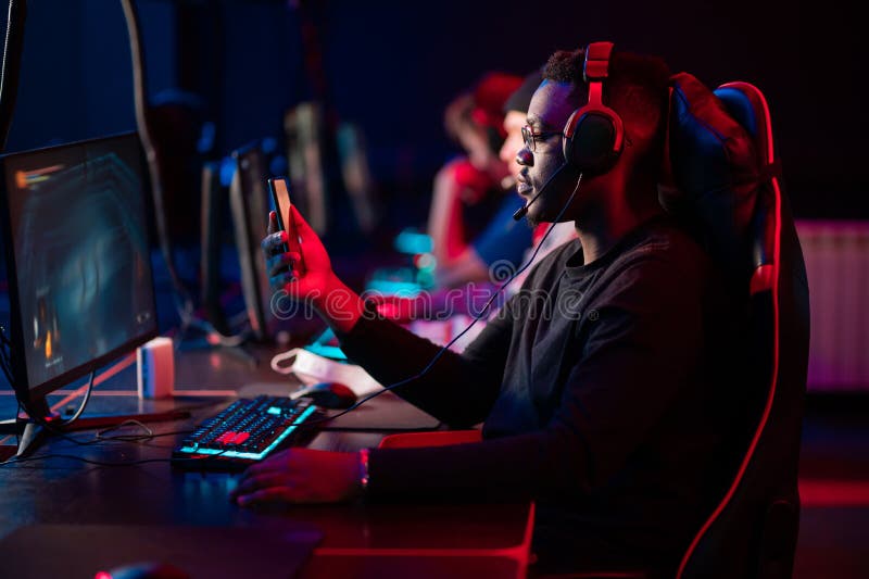 An African Guy Talks on a Video Link with His Friends in a Computer ...