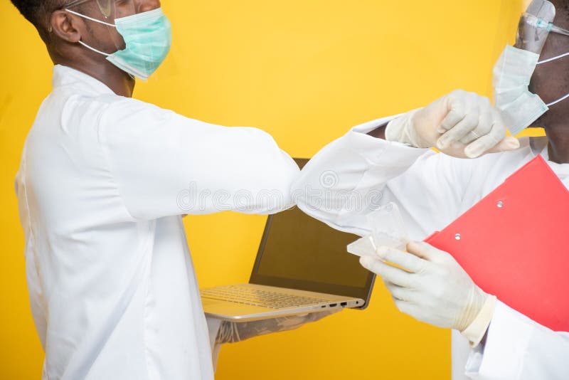 African Lab Scientists Greet by Touching Their Elbows Stock Photo ...