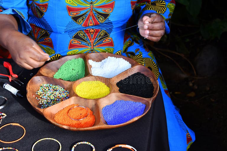 African Lady Stringing Necklace with Small Beads Stock Image - Image of ...