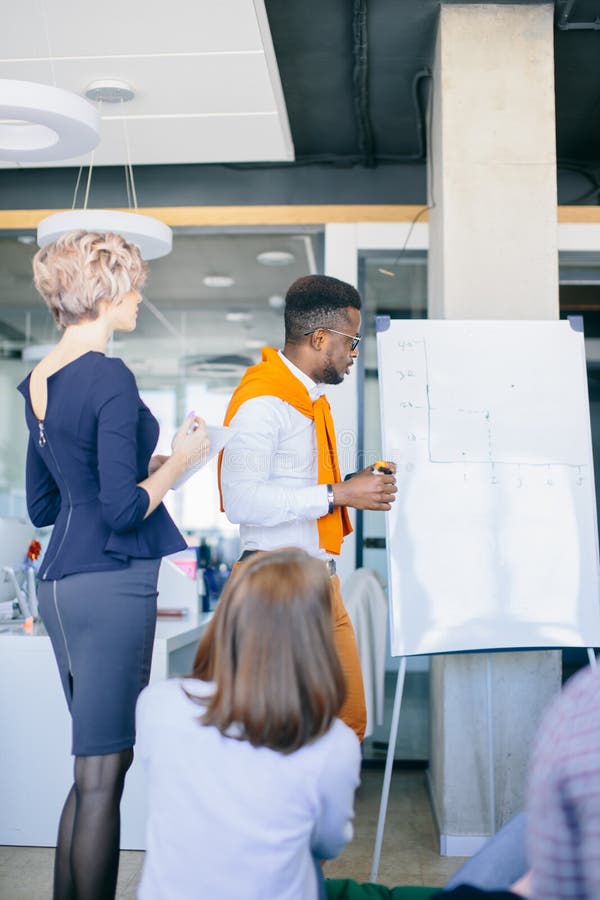 African Male Writing Something on Whiteboard Stock Image - Image of ...