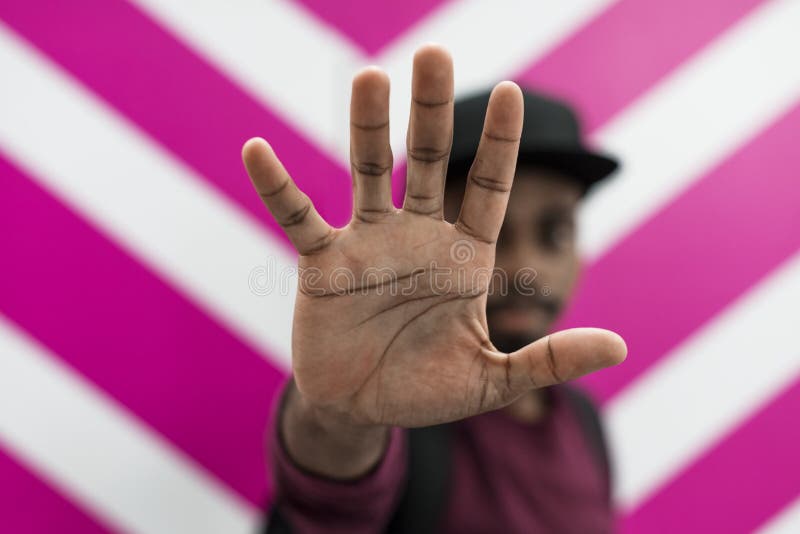 African Man Doing a `Talk To the Hand!` Pose Stock Image - Image of ...