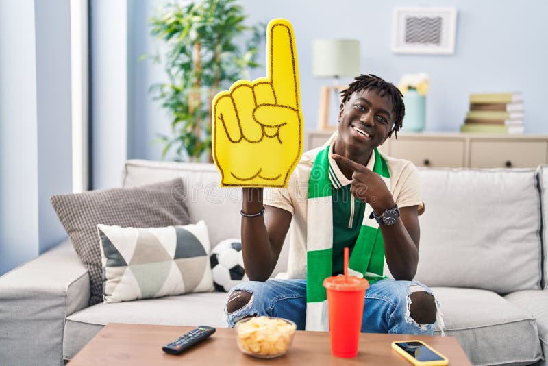 African Man with Dreadlocks Football Hooligan Supporting Team Smiling ... African Man with Dreadlocks Football Hooligan Supporting Team Smiling ...