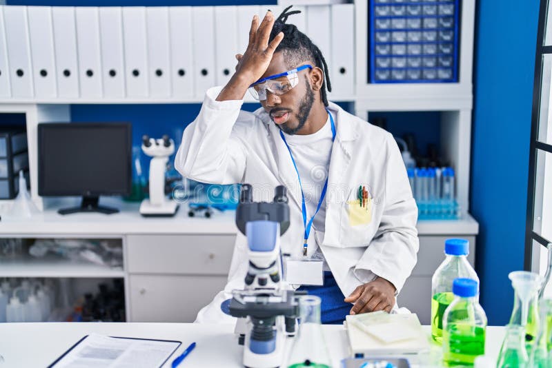 African Man with Dreadlocks Working at Scientist Laboratory Surprised ... African Man with Dreadlocks Working at Scientist Laboratory Surprised ...
