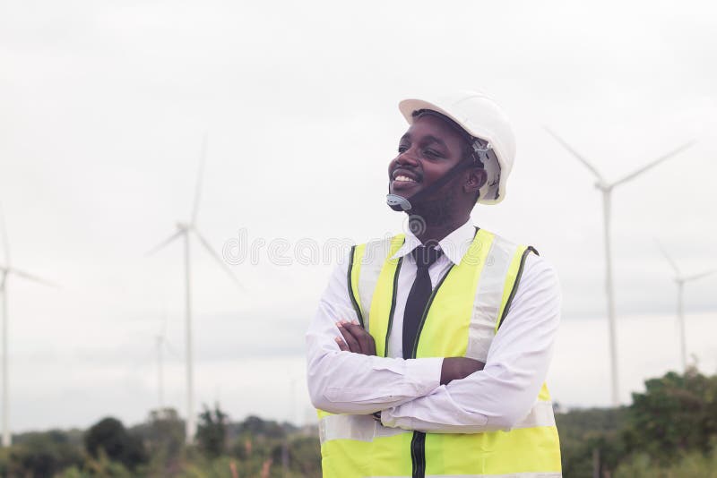 African Man Engineer Standing with Wind Turbine Stock Photo - Image of ...