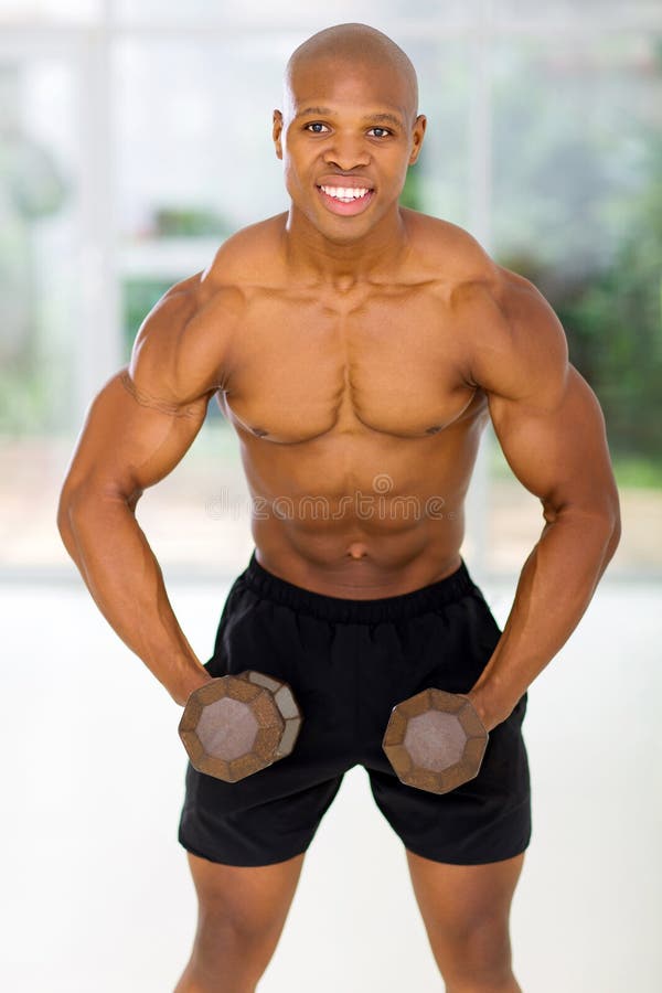African Man Exercising Dumbbells Stock Image - Image of hunk, abdomen ...