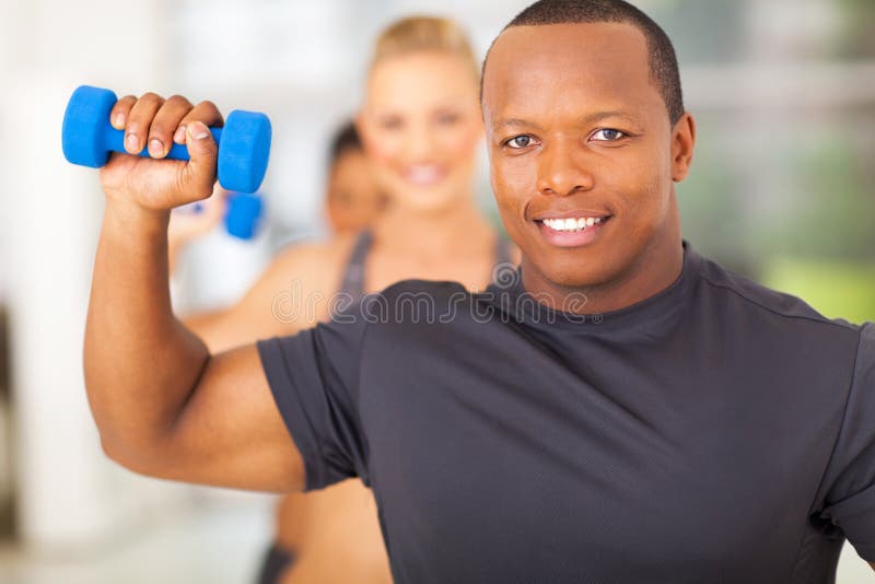 Man exercising in gym stock image. Image of tracksuit - 44856615