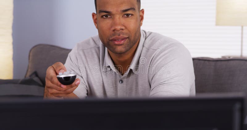 Black Man Flipping Channels Tv Stock Photos - Free & Royalty-Free Stock ...