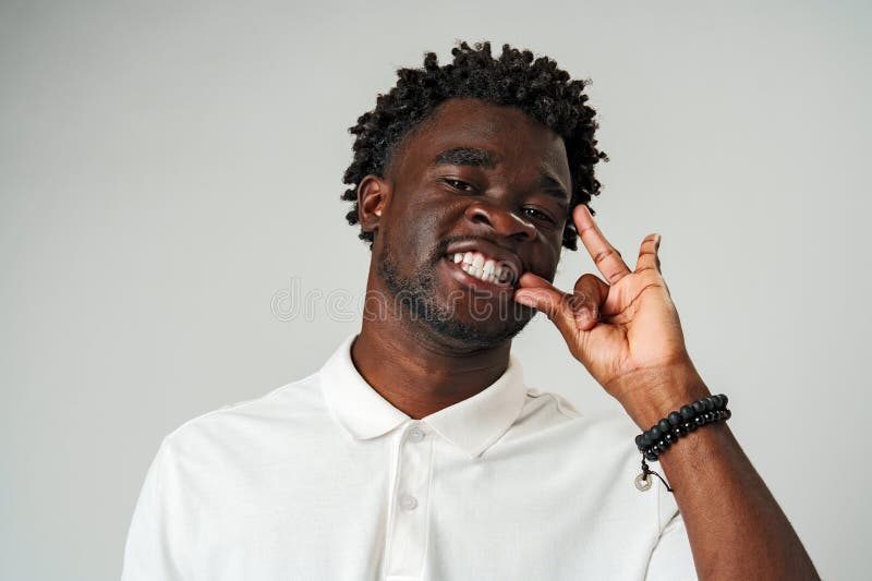 African Man Making a Hush Gesture with Finger Stock Image - Image of ...