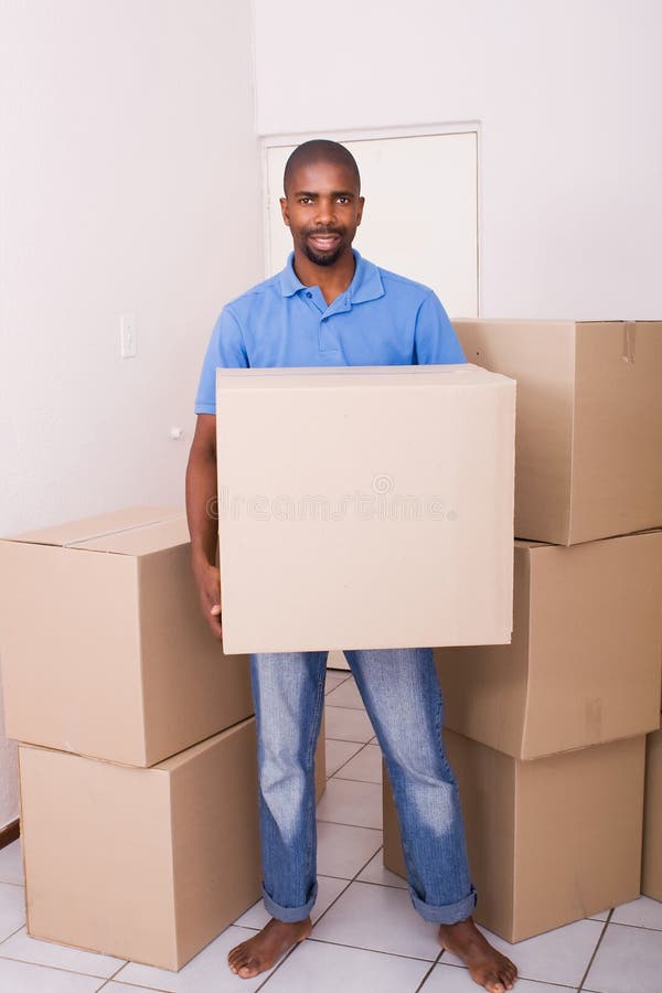 African man moving stock photo. Image of heavy, pack - 10665414