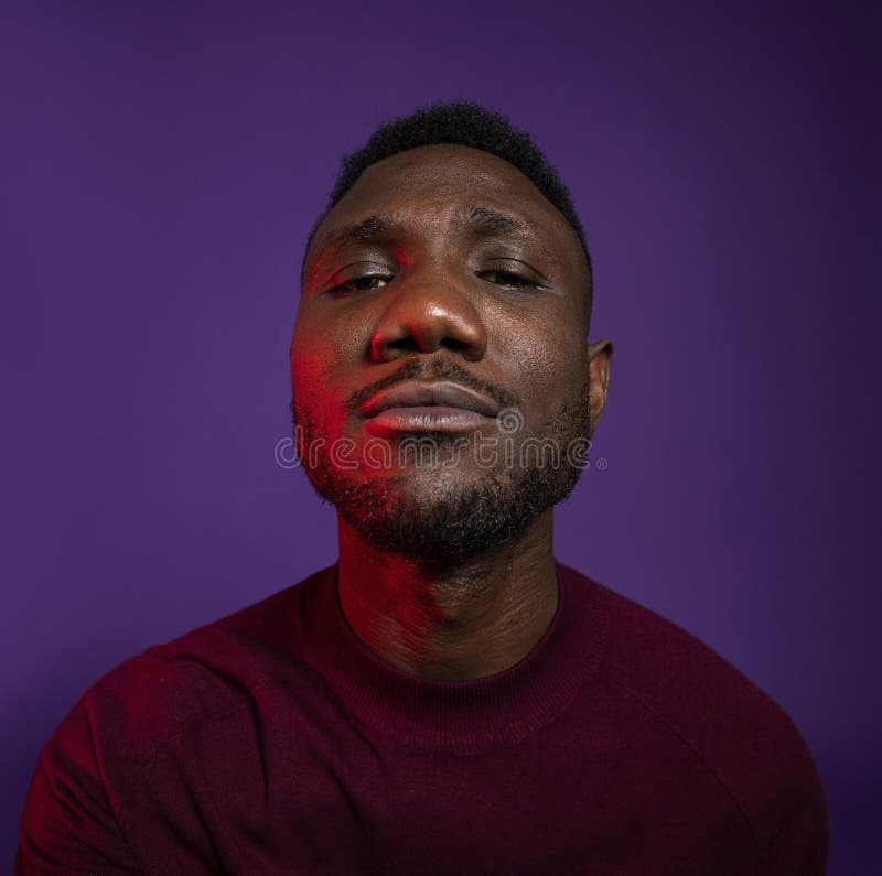 African Man with Nose Raised Looking at Camera Stock Photo - Image of ...