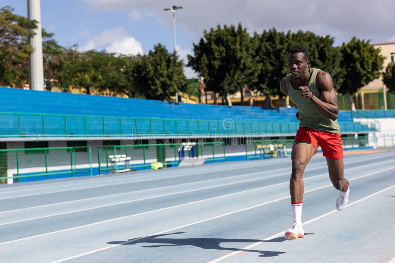 African Man Running on Athletics Track Stock Photo - Image of exercise ...