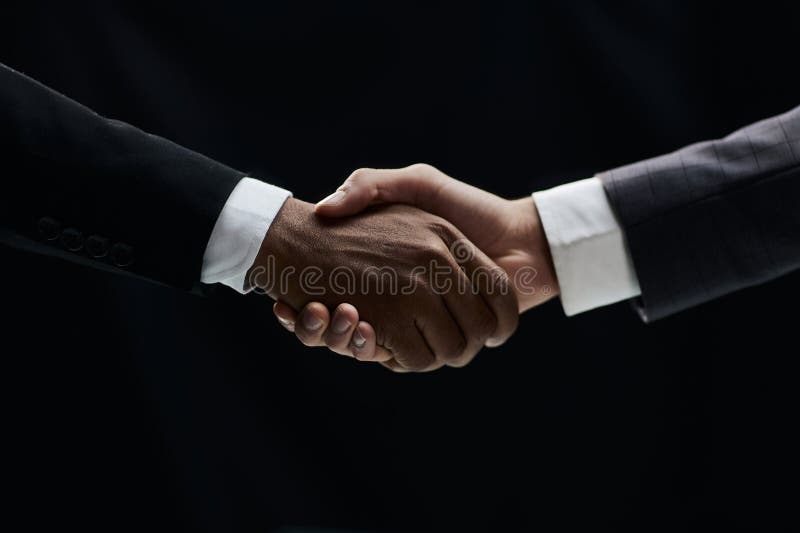 African Man& X27;s Hand Shaking White Man& X27;s Hand on Black ...