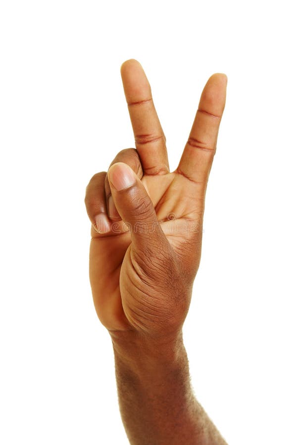 Showing the victory sign stock image. Image of middle - 12491869