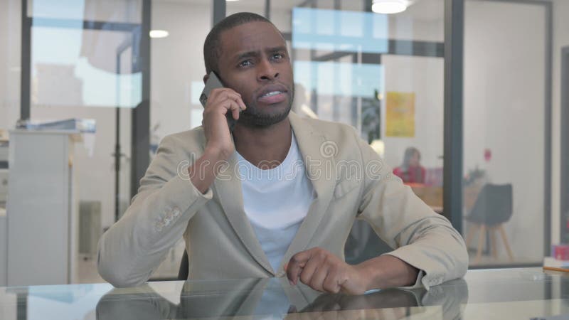 African Man Talking on Phone, Doing Negotiation Stock Footage - Video ...