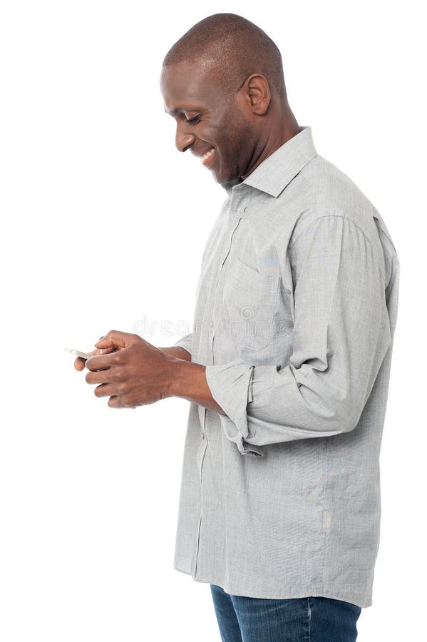 African Man Using His Mobile Phone Stock Photo - Image of middle, male ...