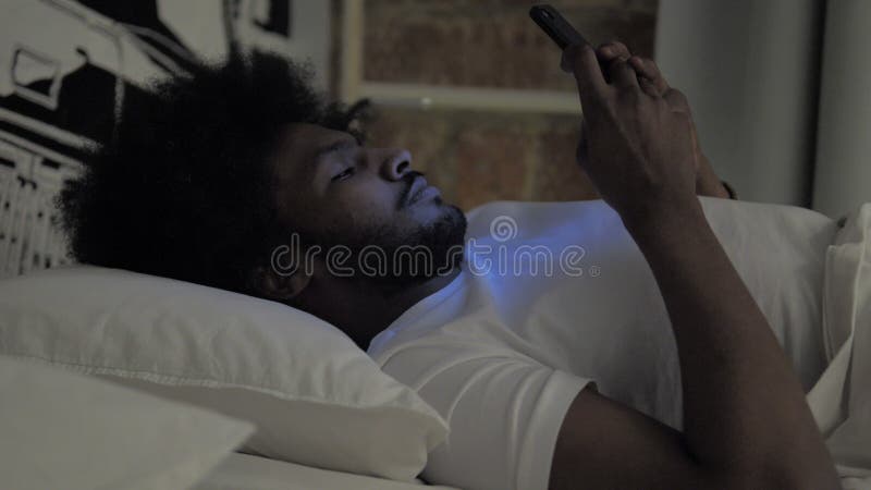 African Man Crying in Bed at Night Stock Footage - Video of bedroom ...