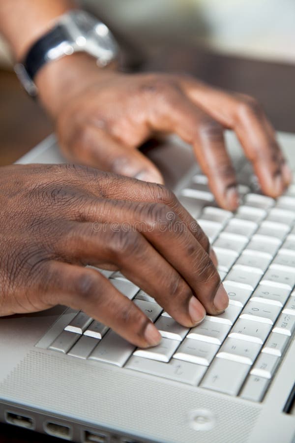 African Man Working on a Computer Stock Image - Image of descent ...