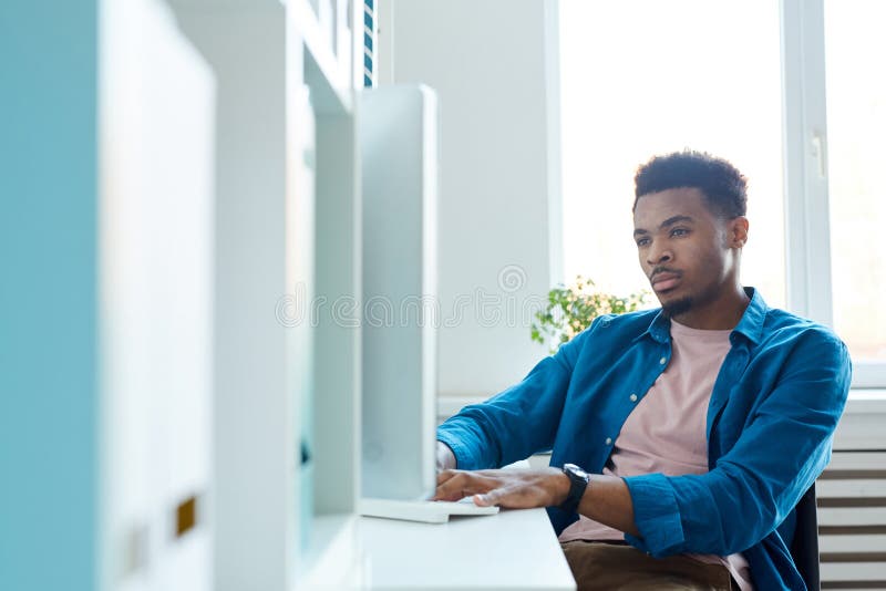 African Man Working on Computer Stock Photo - Image of occupation ...