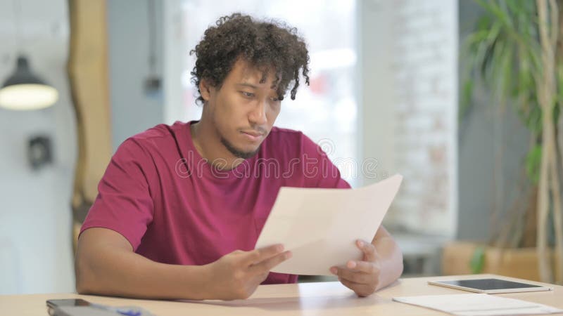 African Man Working on Documents in Office, Paperwork Stock Footage ...