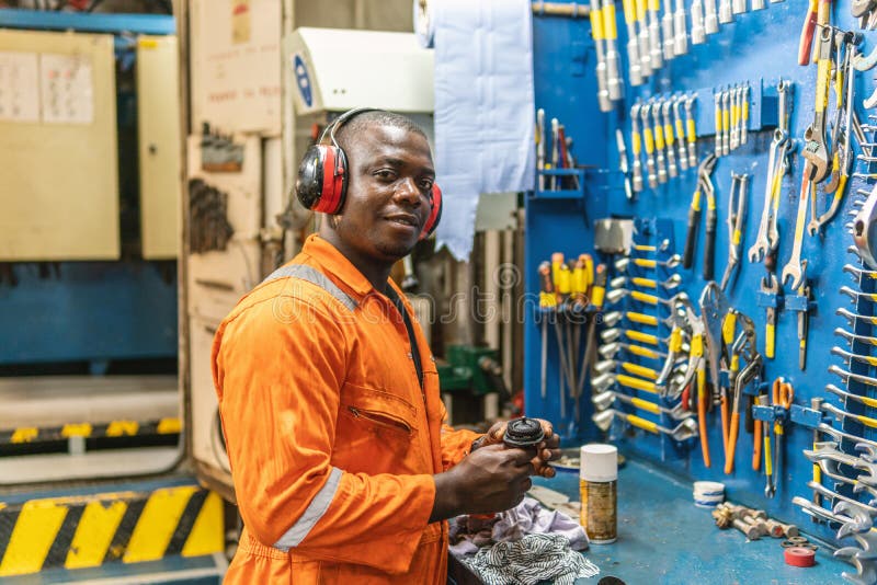 Marine Engineer Officer Working in Engine Room Stock Photo - Image of ...