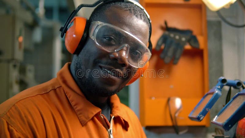 African Marine Engineer Officer in Engine Control Room ECR. Stock ...