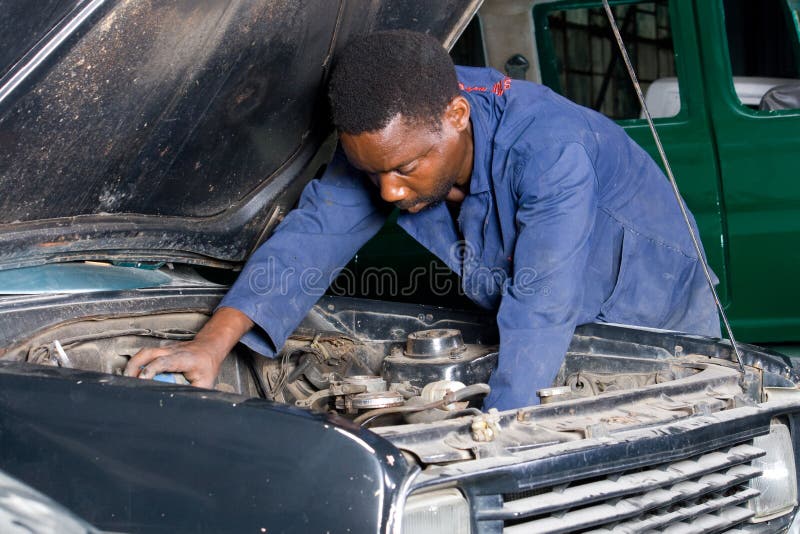 African Mechanic Repairing a Car Stock Image - Image of cheap, garage ...