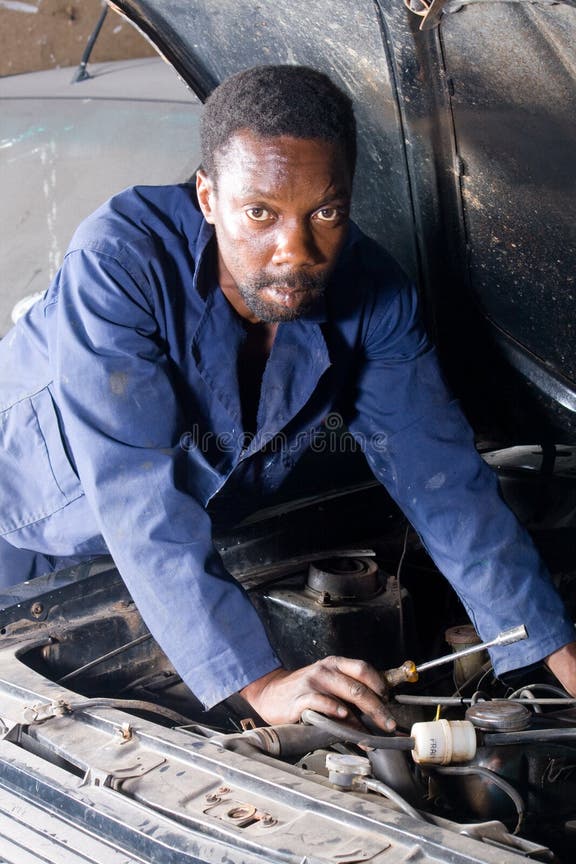African mechanic at work stock photo. Image of beater - 7456854