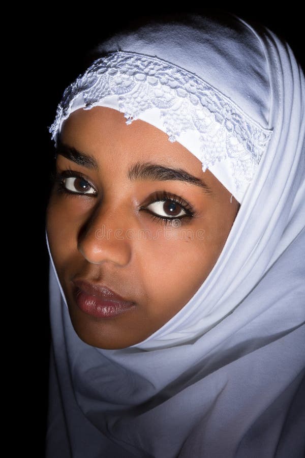 Mysterious Female Face in Ocher Head Wrap Stock Image - Image of ...