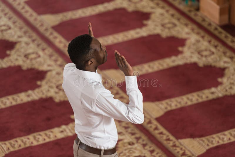 African Prayer at Mosque stock photo. Image of afro, clothing - 51391568