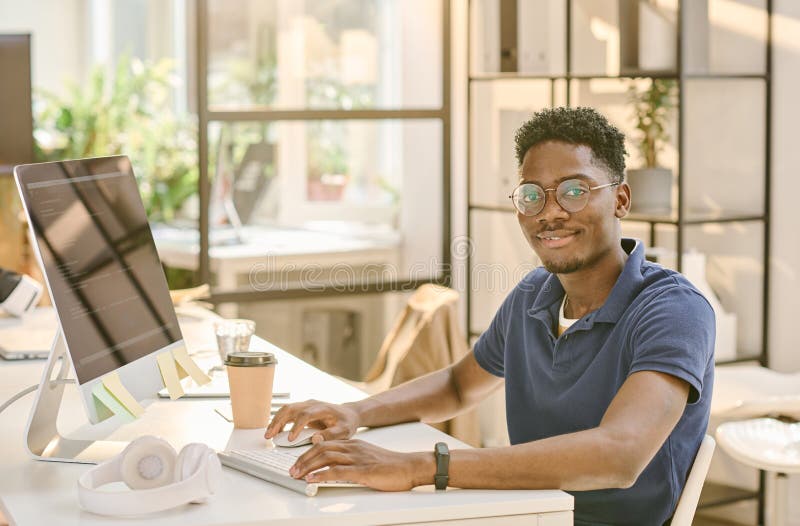 African Programmer Working at His Workplace Stock Photo - Image of ...