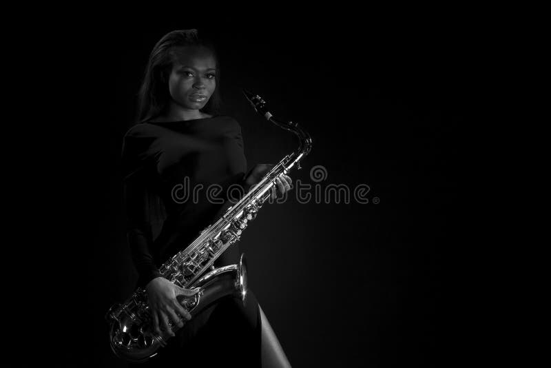 Beauty with Sax stock photo. Image of gorgeous, young - 65789186