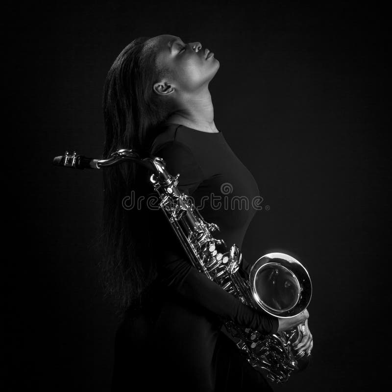 Beauty with Sax stock photo. Image of jazz, music, tenor - 65789042