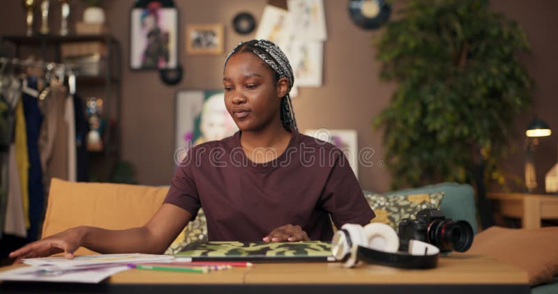African Software Developer Using Computer in Living Room To Code, Debug ...