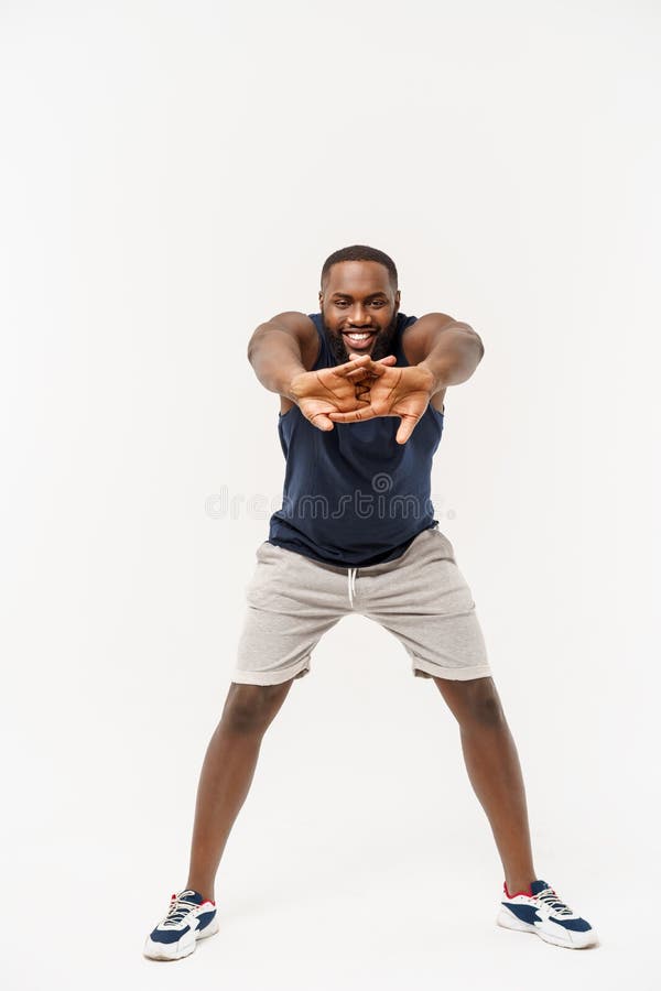 African Sport Man Exercising and Stretching on White Background Stock ...