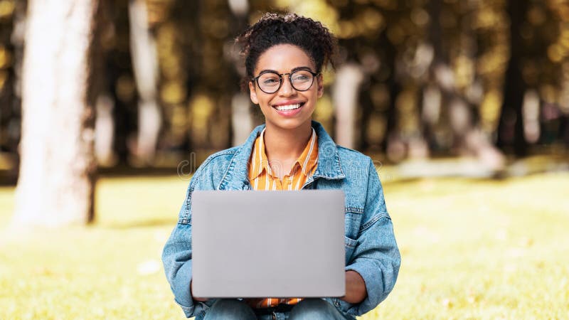 African Student Lady with Laptop Working on Computer Sitting Outdoor ...