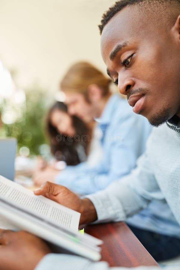 African student reads book stock photo. Image of school - 160526480