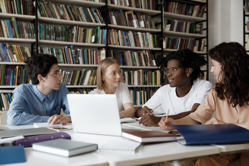 African Student with Schoolmates Discuss Collaborative Task, Studying ... African Student with Schoolmates Discuss Collaborative Task, Studying ...