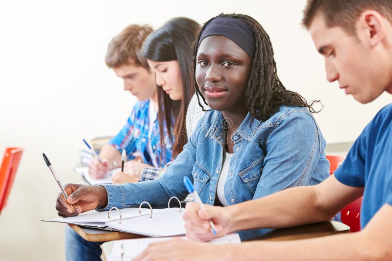 Student Taking Notes in Class Stock Photo - Image of student, school ...