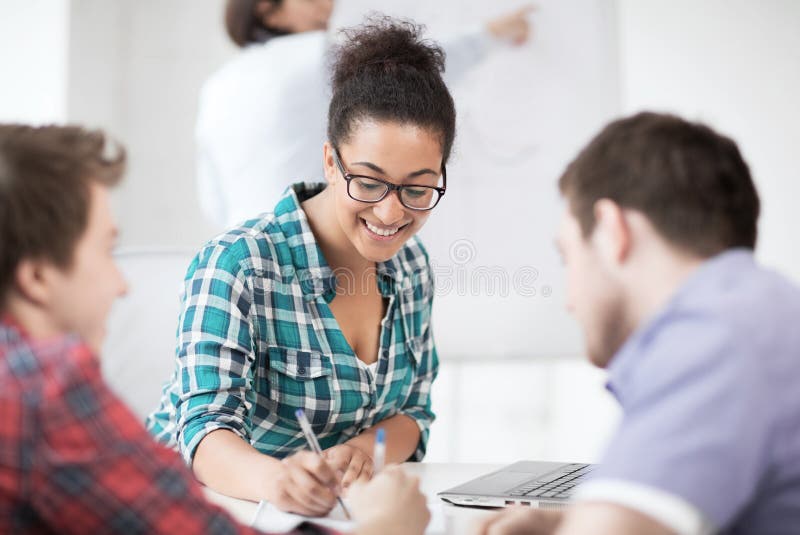 African Student Writing Something in Notebook Stock Photo - Image of ...