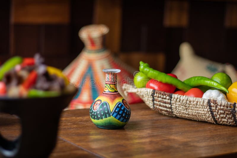 African Style Glass Pitcher with Beautiful Paintings on the Table Stock ...
