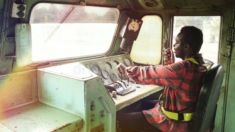 An African Train Driver Controls a Train by Talking To the Station ...