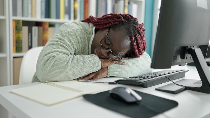 African Woman with Braided Hair Student Sleeping by Computer at ...