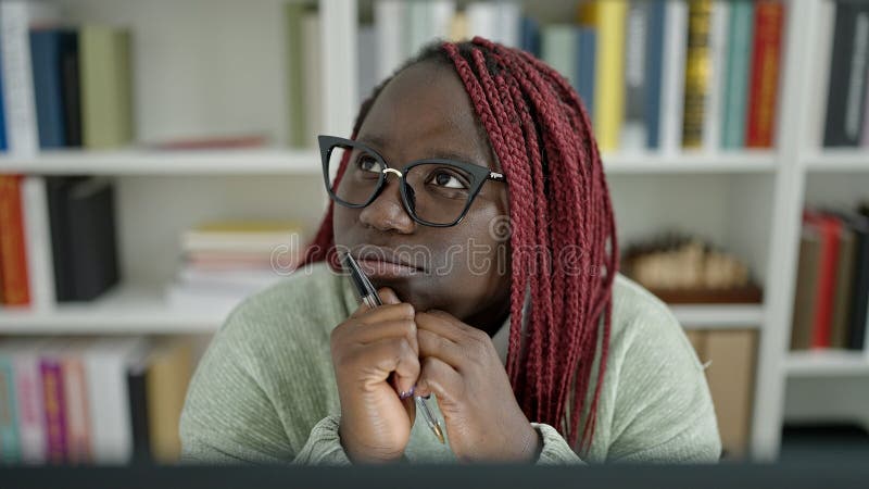 African Woman with Braided Hair Using Computer Thinking at University ...