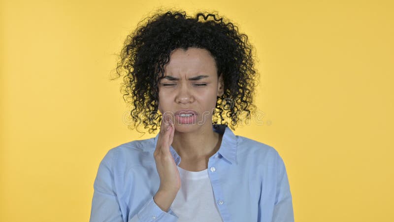 African Woman Having Toothache, Yellow Background Stock Image - Image ...