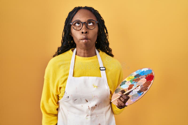 African Woman Holding Painter Palette Making Fish Face with Lips, Crazy ...