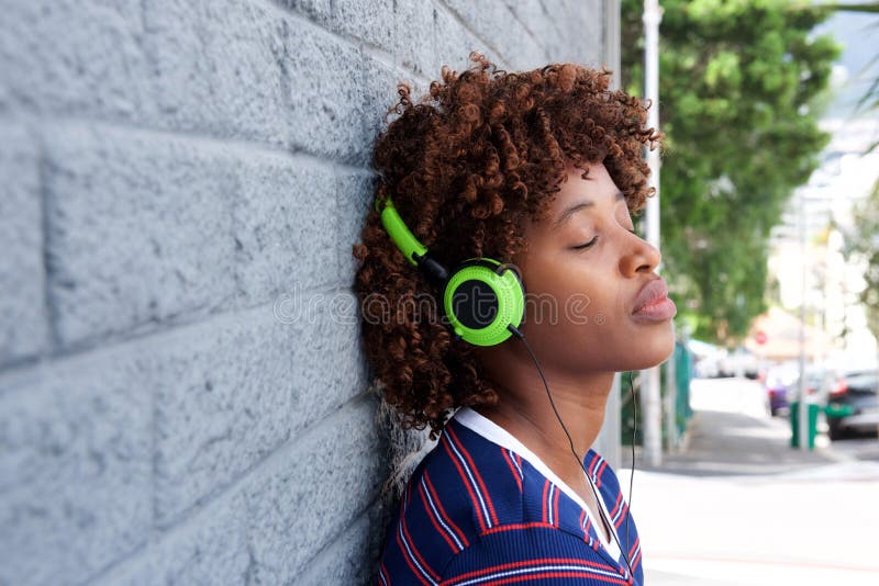 African Woman Listening To Music With Headphones Stock Image Image Of