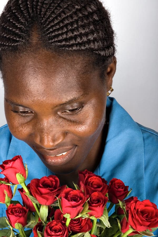 African woman with roses stock image. Image of romance - 1856919